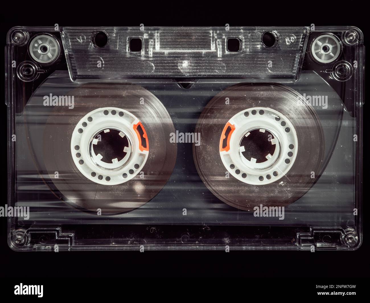 Old vintage cassette tapes on black background Stock Photo - Alamy