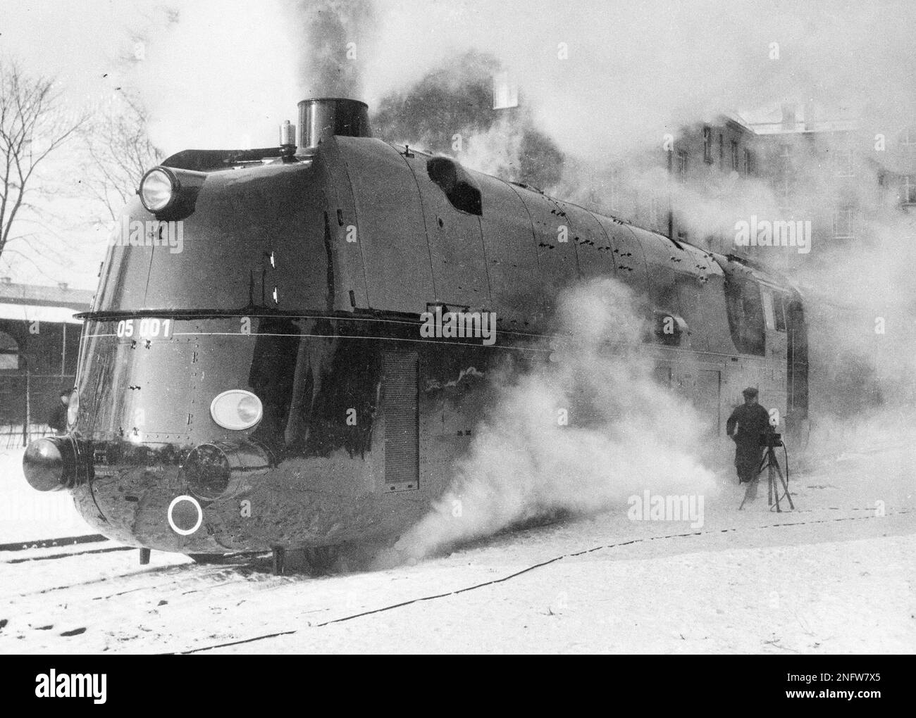 The streamlined engine of a German railway train is shown in Berlin ...