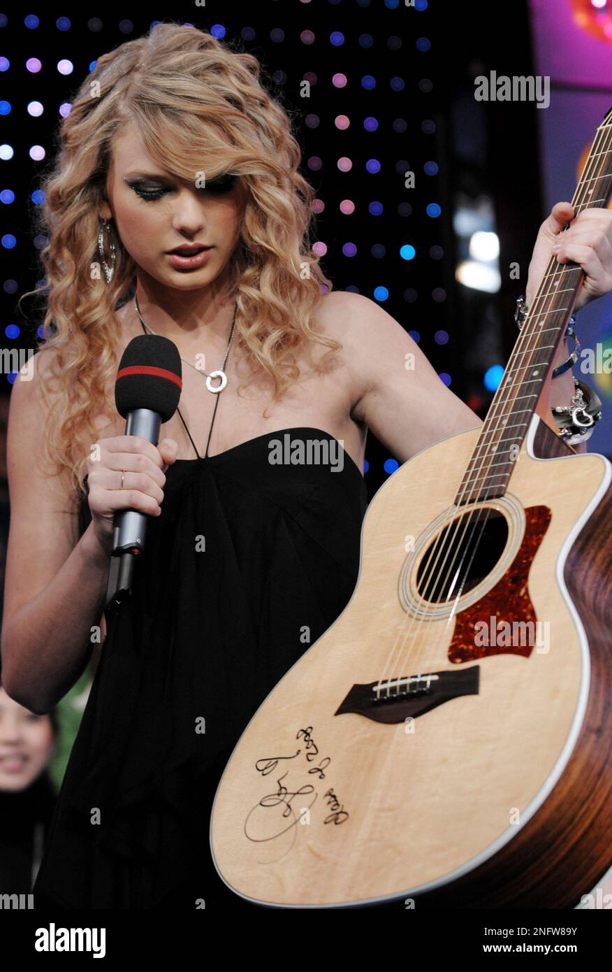 Singer Taylor Swift makes an appearance on MTV's Total Request Live ...