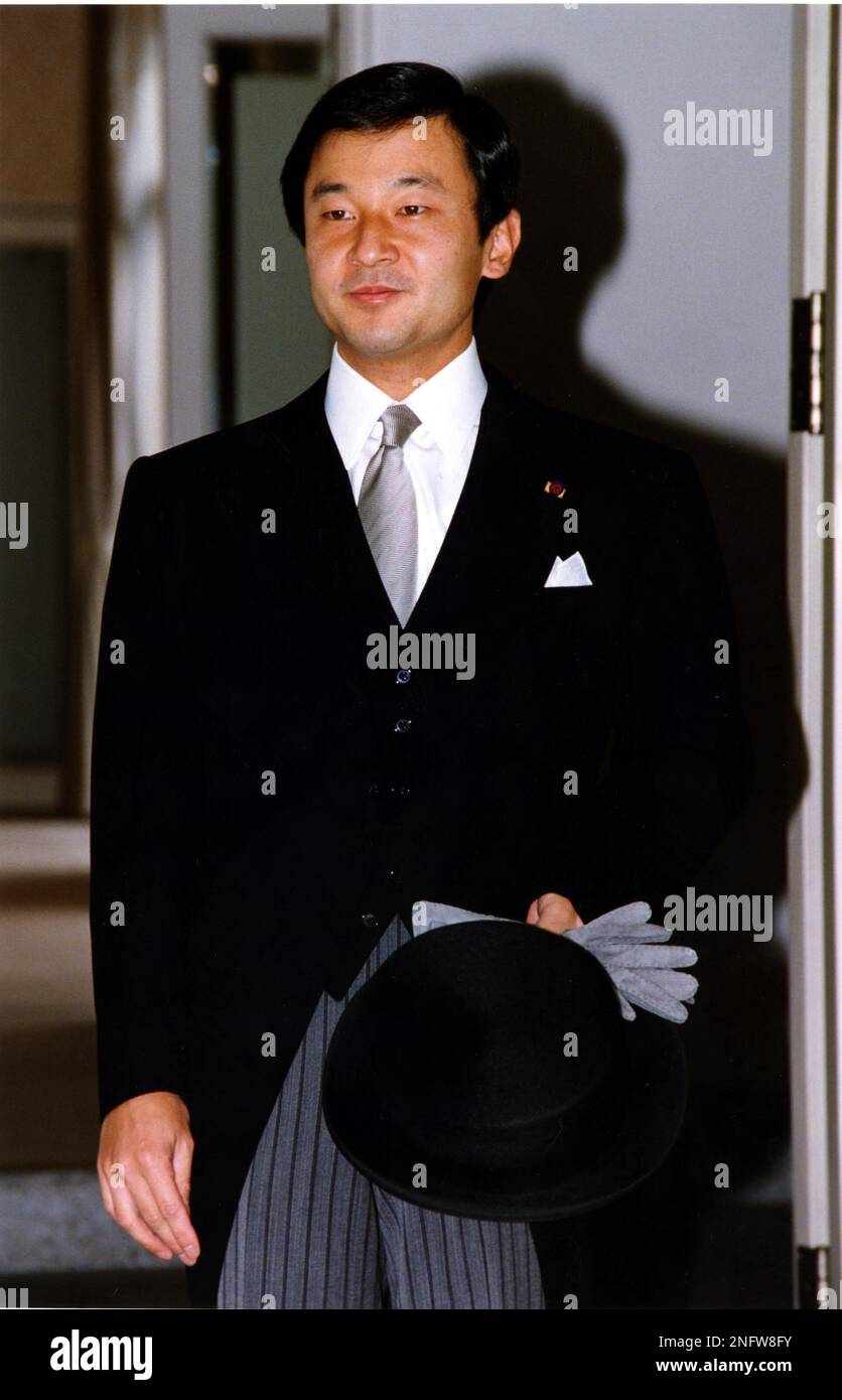 Crown Prince Naruhito waits for his limousine Wednesday, June 9, 1993 ...