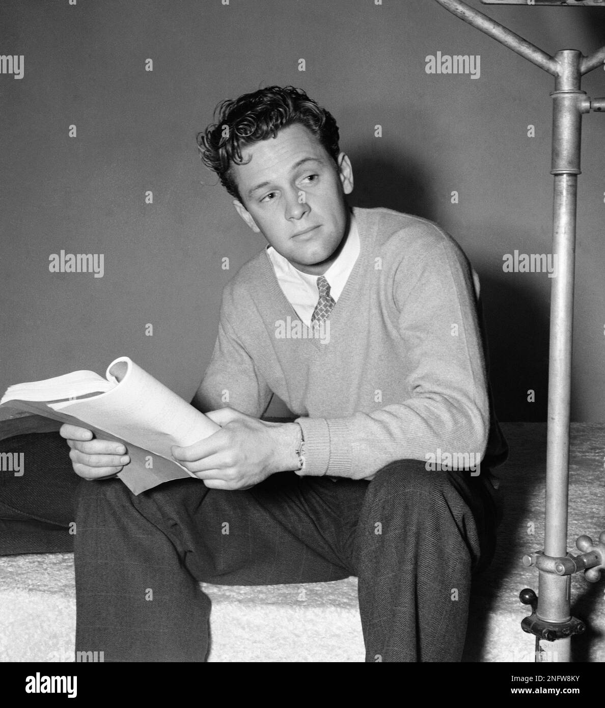Actor Bill Holden plays the leading male role opposite Barbara Stanwyck ...
