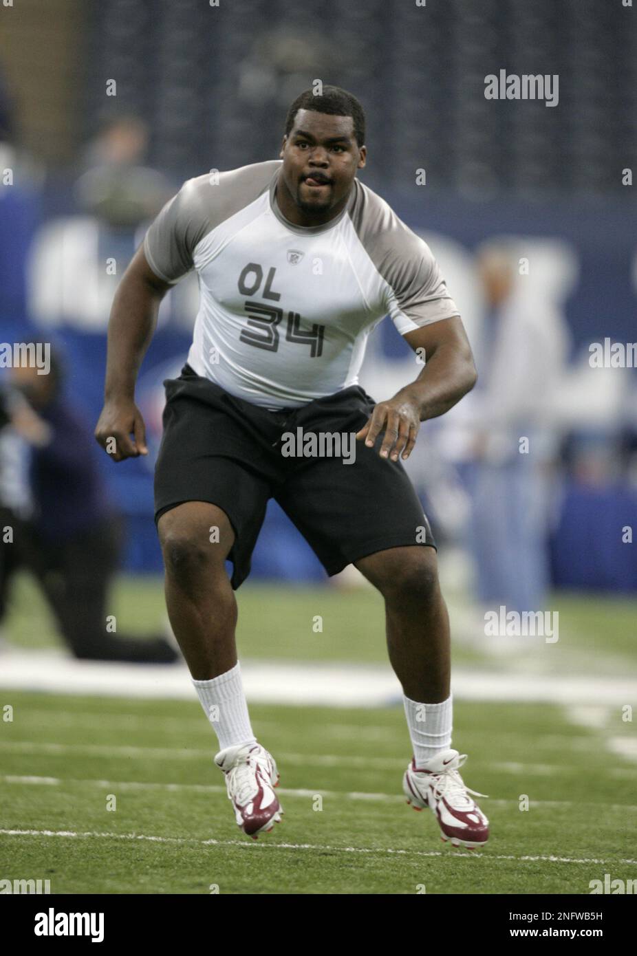 Offensive lineman Chil Rachal of Southern California runs a drill at ...