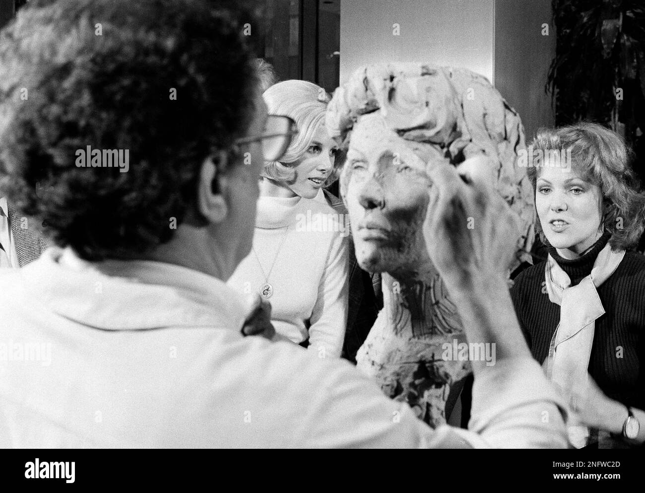 British actress Lynn Redgrave, right, sits in a New York gallery as ...