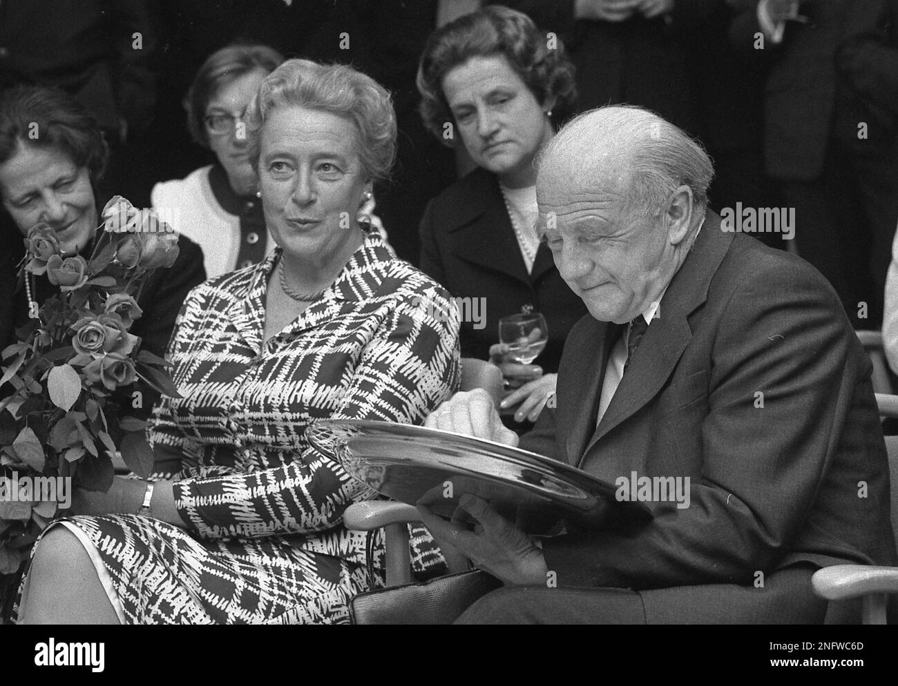 Nobel laurate physicist Prof. Dr. Werner Heisenberg, right, looks at a ...
