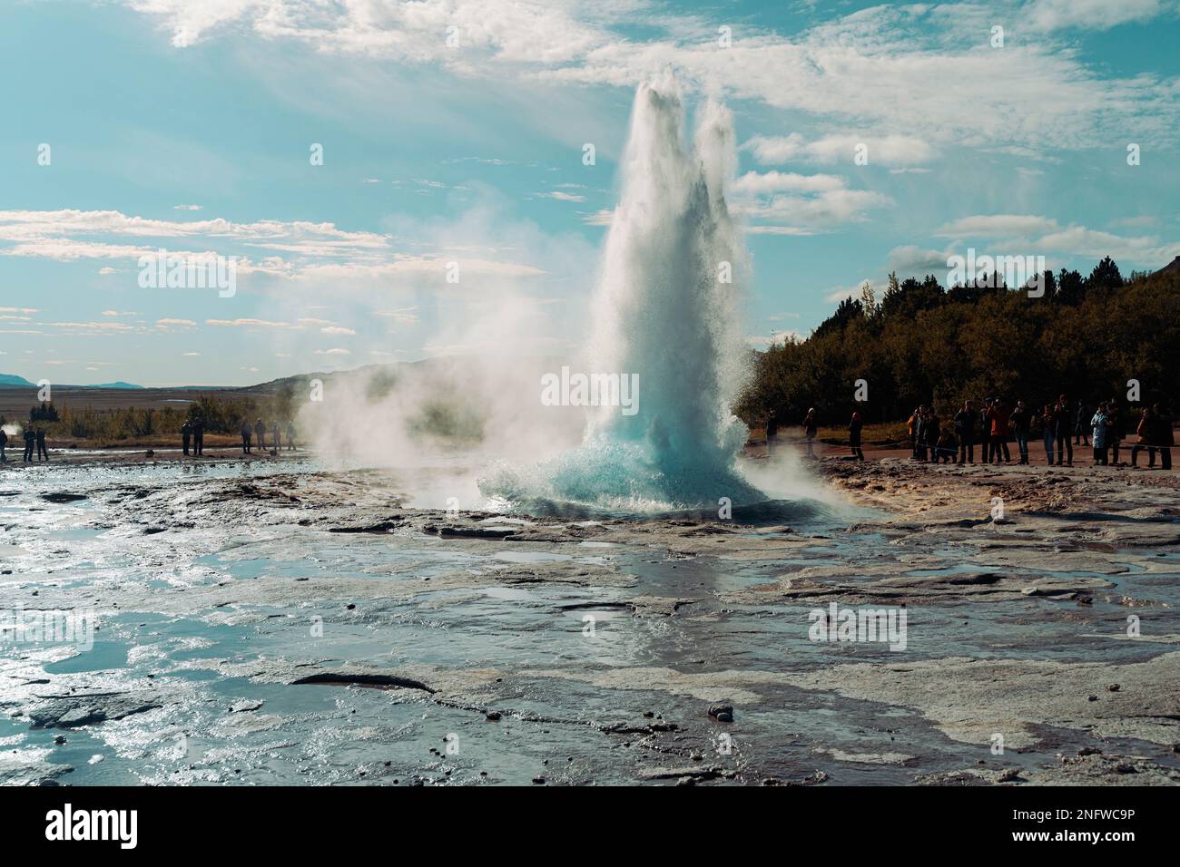 A view of the geyser in the landscape Stock Photo - Alamy