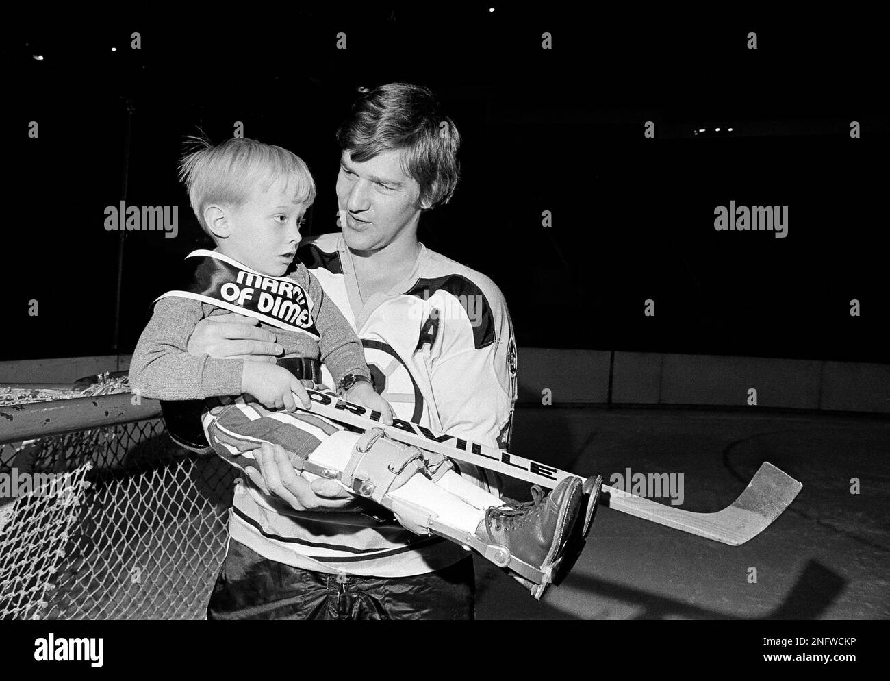 Boston Bruins' Bobby Orr is shown with Scott Wade Hafen, 5, of Las ...