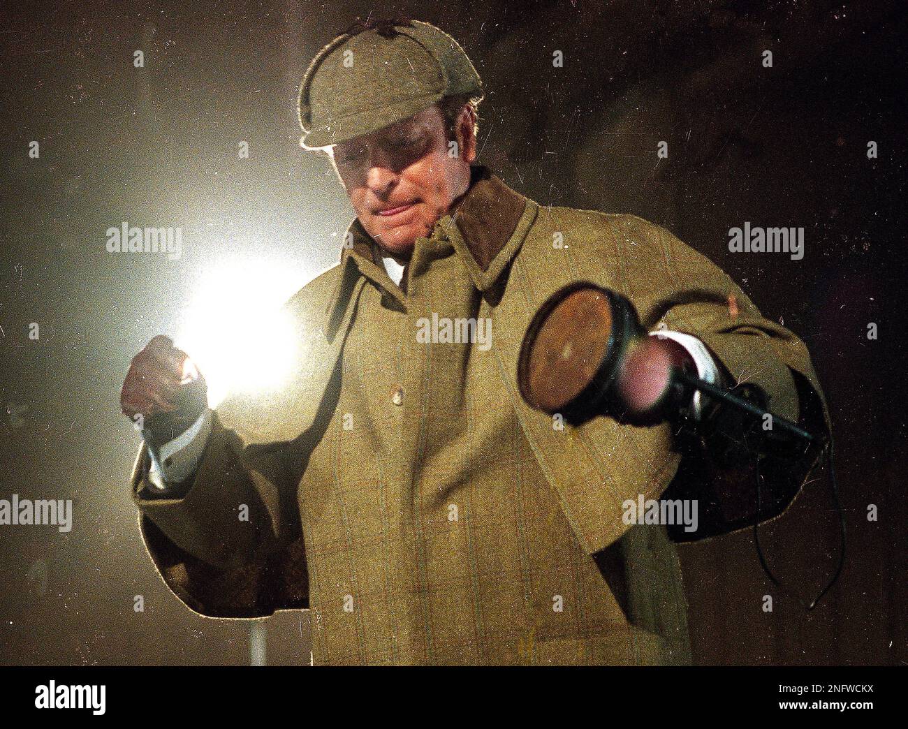 British actor Michael Caine is shown on the set in a London cellar ...
