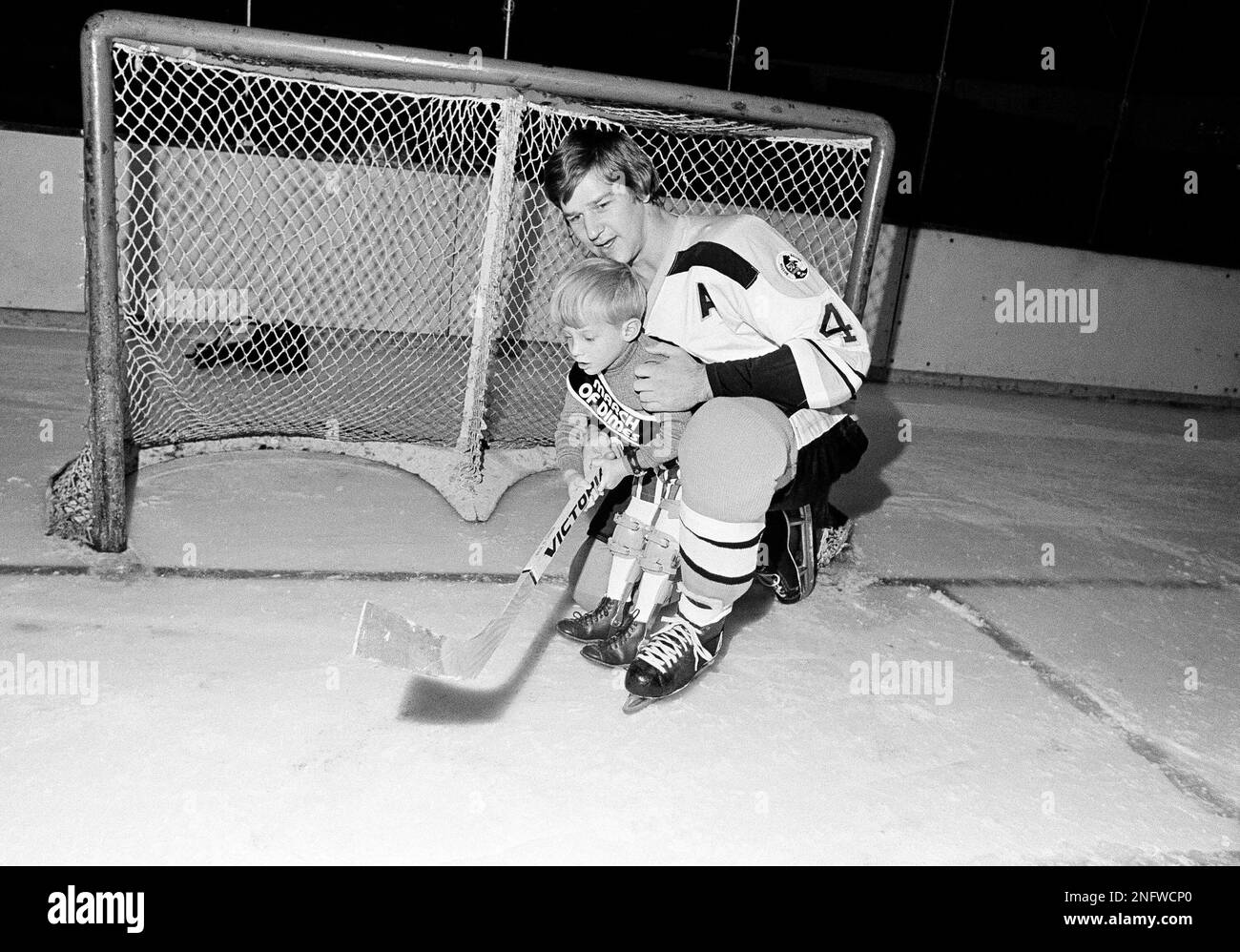Boston Bruins' Bobby Orr is shown with Scott Wade Hafen, 5, of Las ...