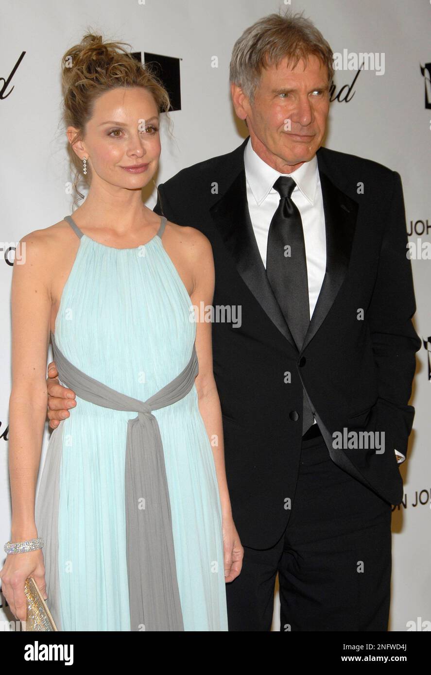Actress Calista Flockhart, left, and actor Harrison Ford pose on the ...