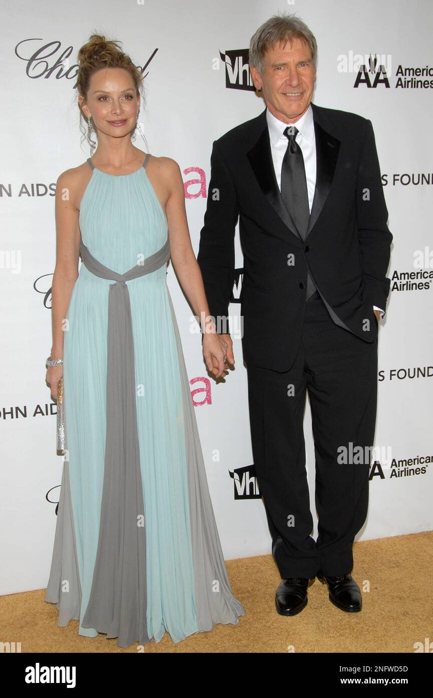 Actress Calista Flockhart, left, and actor Harrison Ford pose on the ...