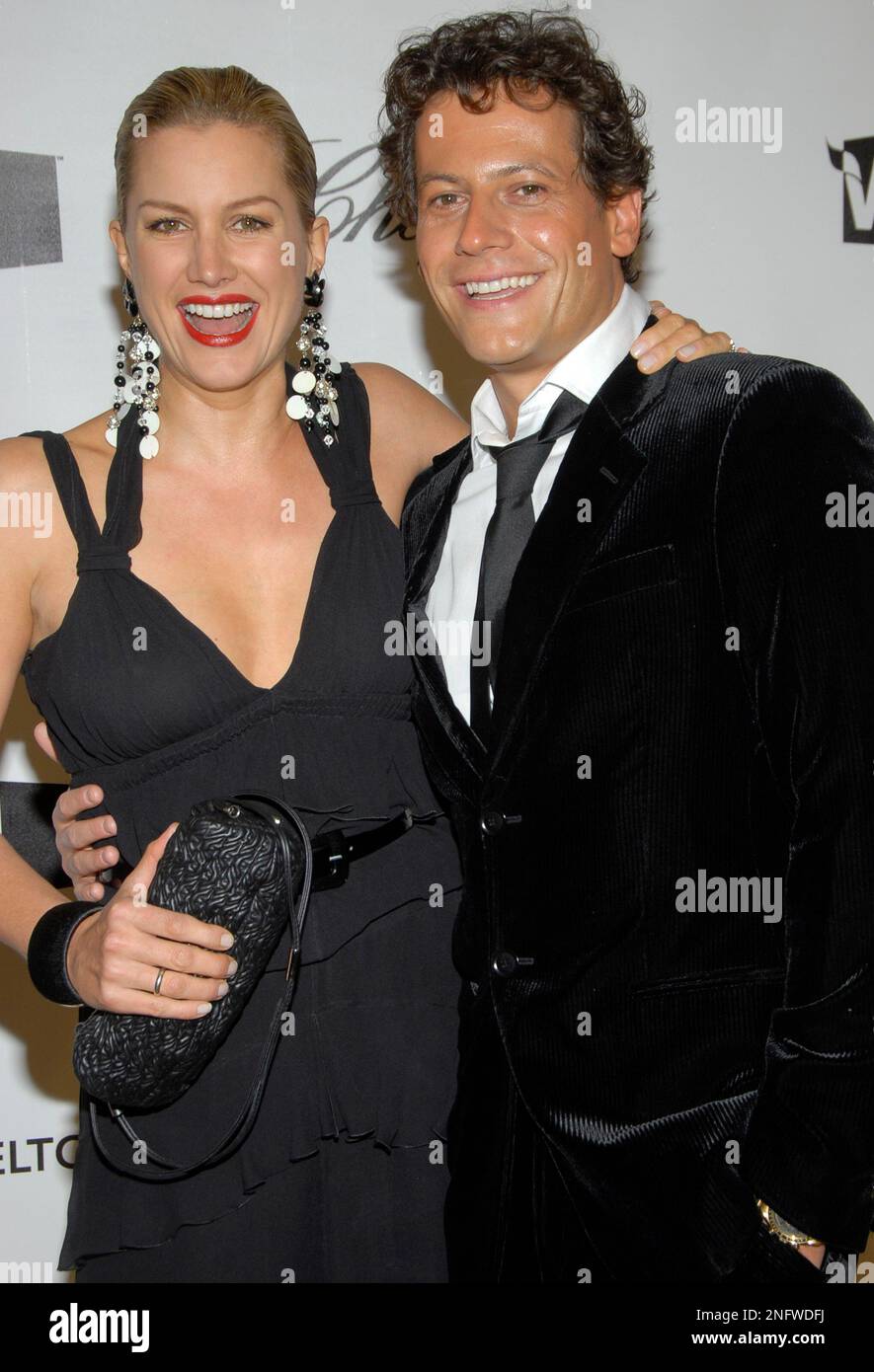 Actress Alice Evans, left, and actor Ioan Gruffudd poses on the press ...