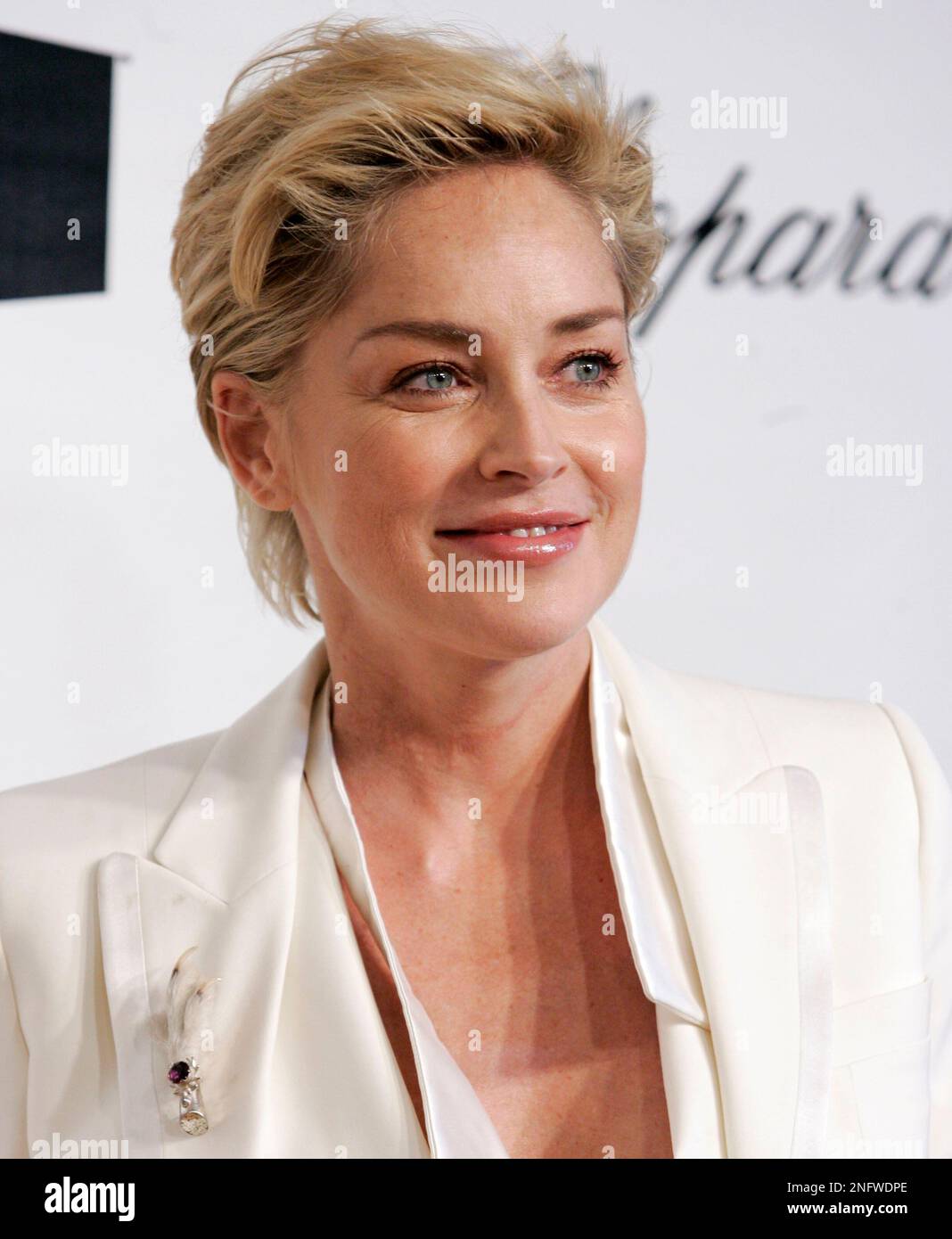 Actress Sharon Stone poses on the press line at the Elton John Oscar ...
