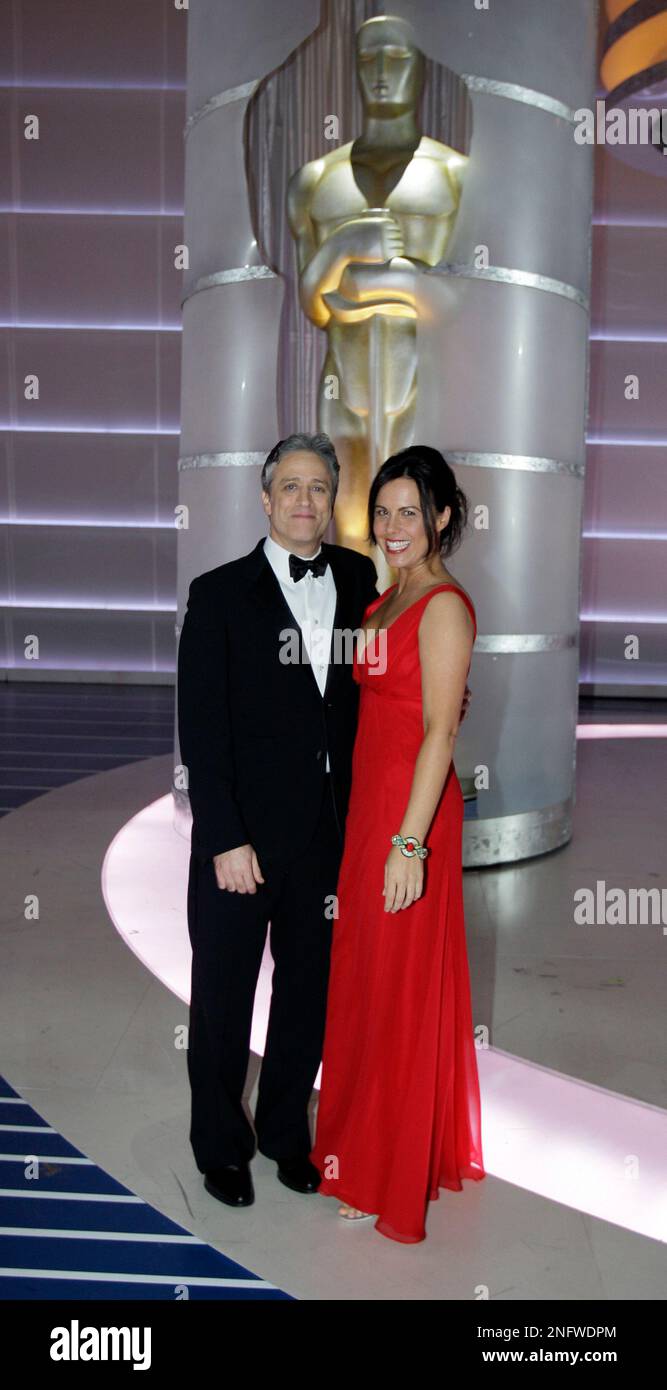 Host Jon Stewart and his wife Tracey McShane pose on stage following ...