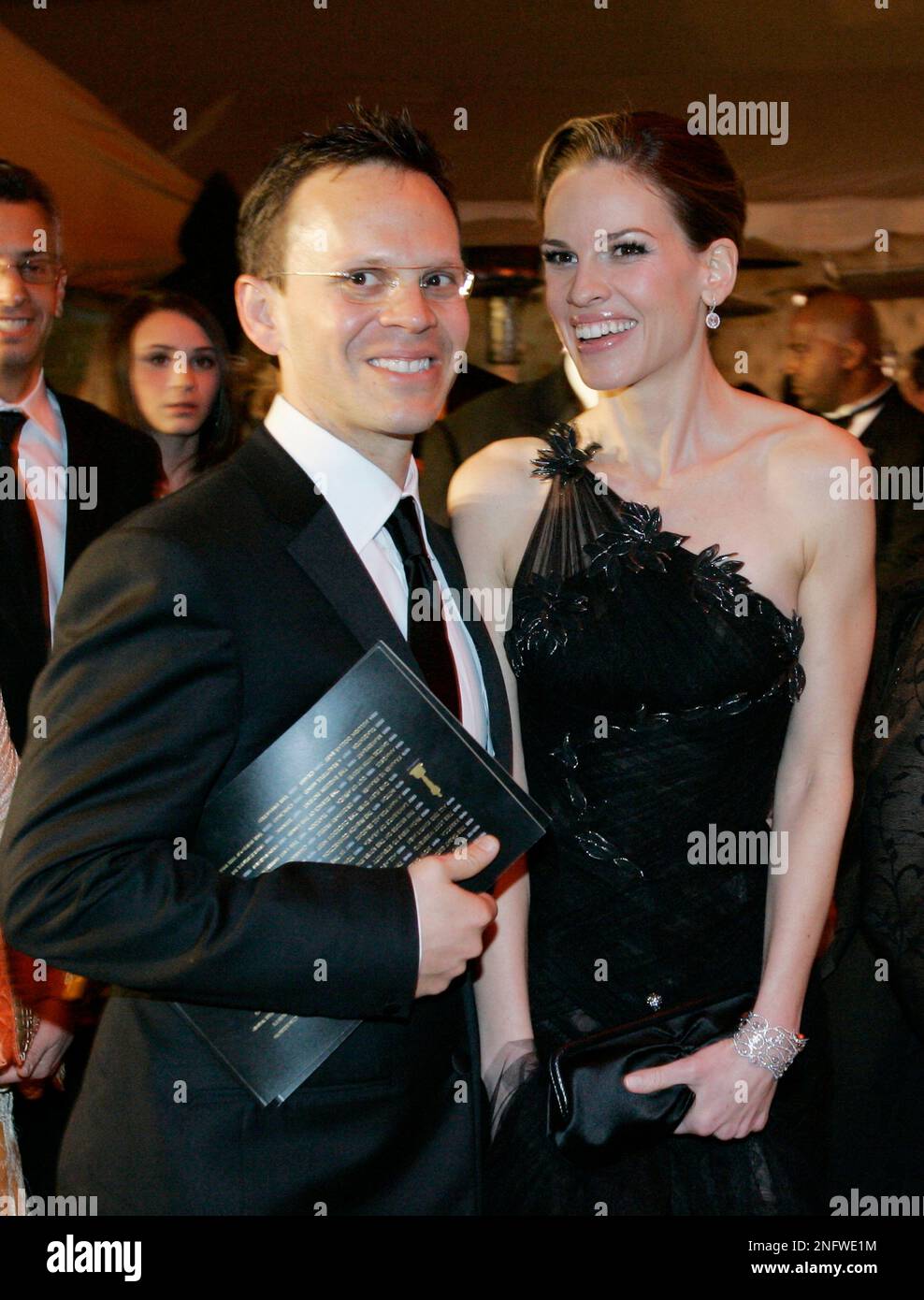 Actress Hilary Swank, right, and her boyfriend John Campisi arrrive for ...