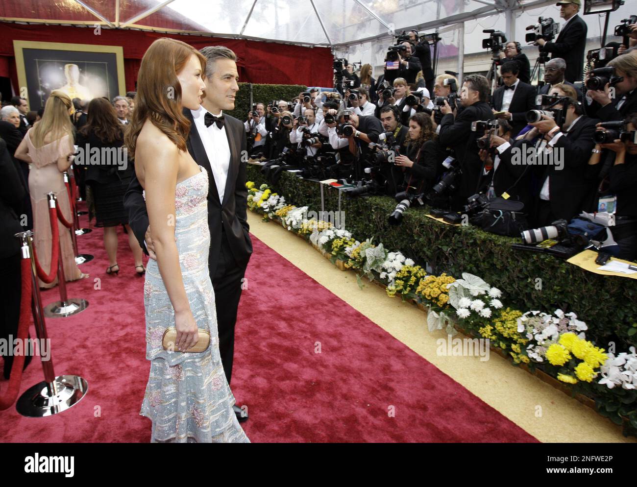 George Clooney and Sarah Larson arrive at the 80th Academy Awards at ...