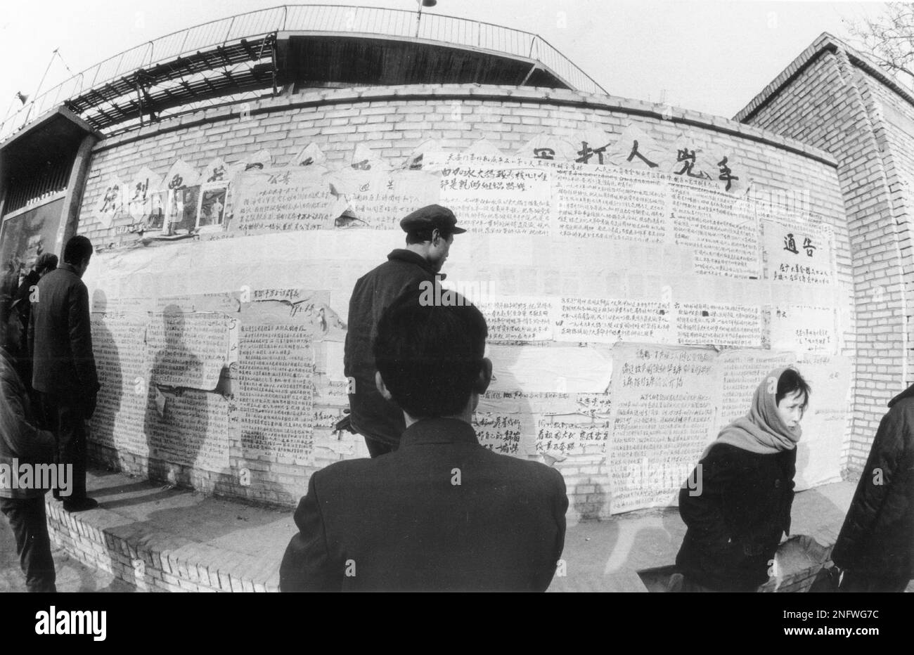 Part of an area known locally as "Democracy Wall," posters criticizing ...