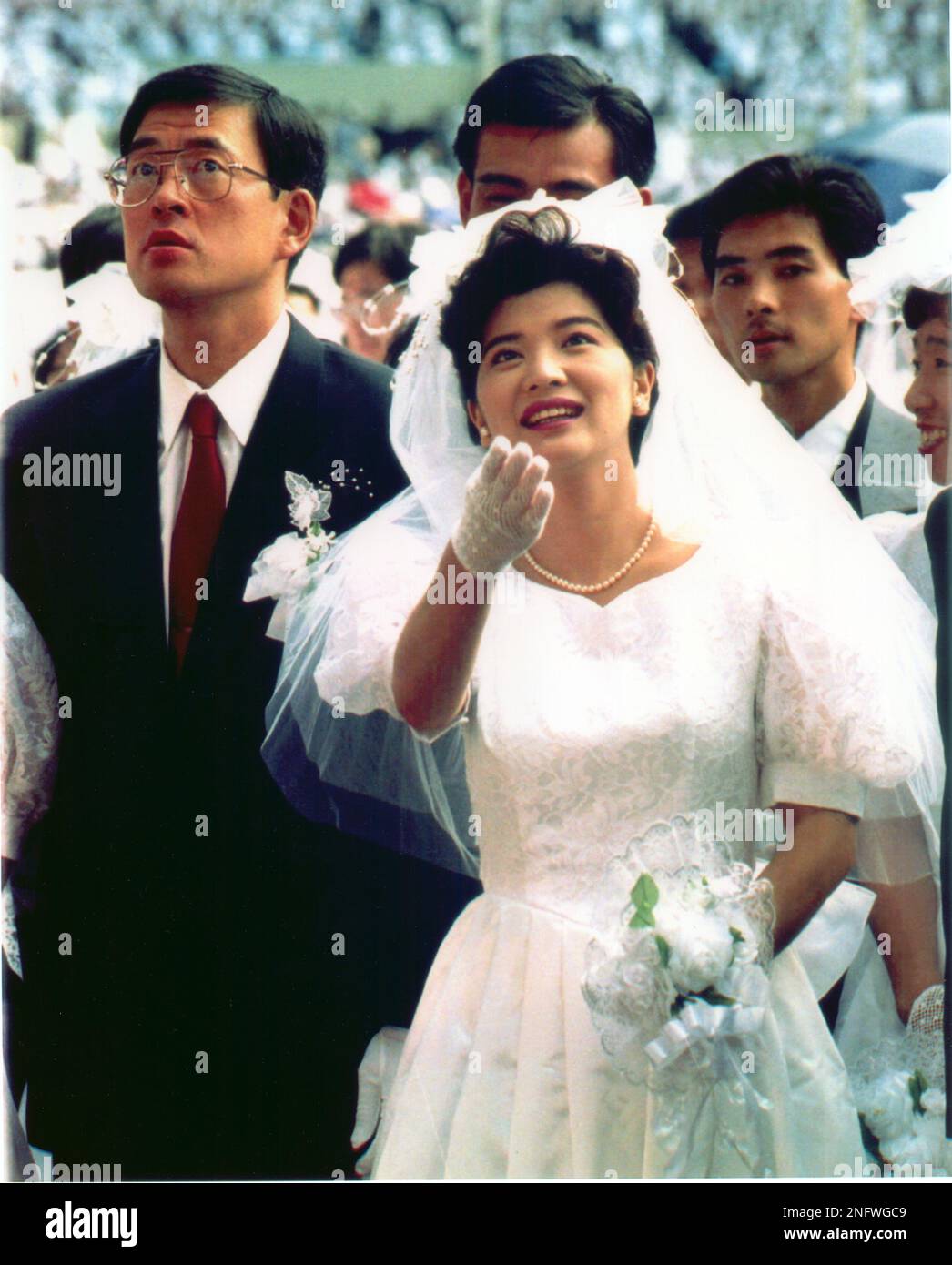 Japanese actress Junko Sakurada and her fiance Nobuyuki Azuma pose for ...