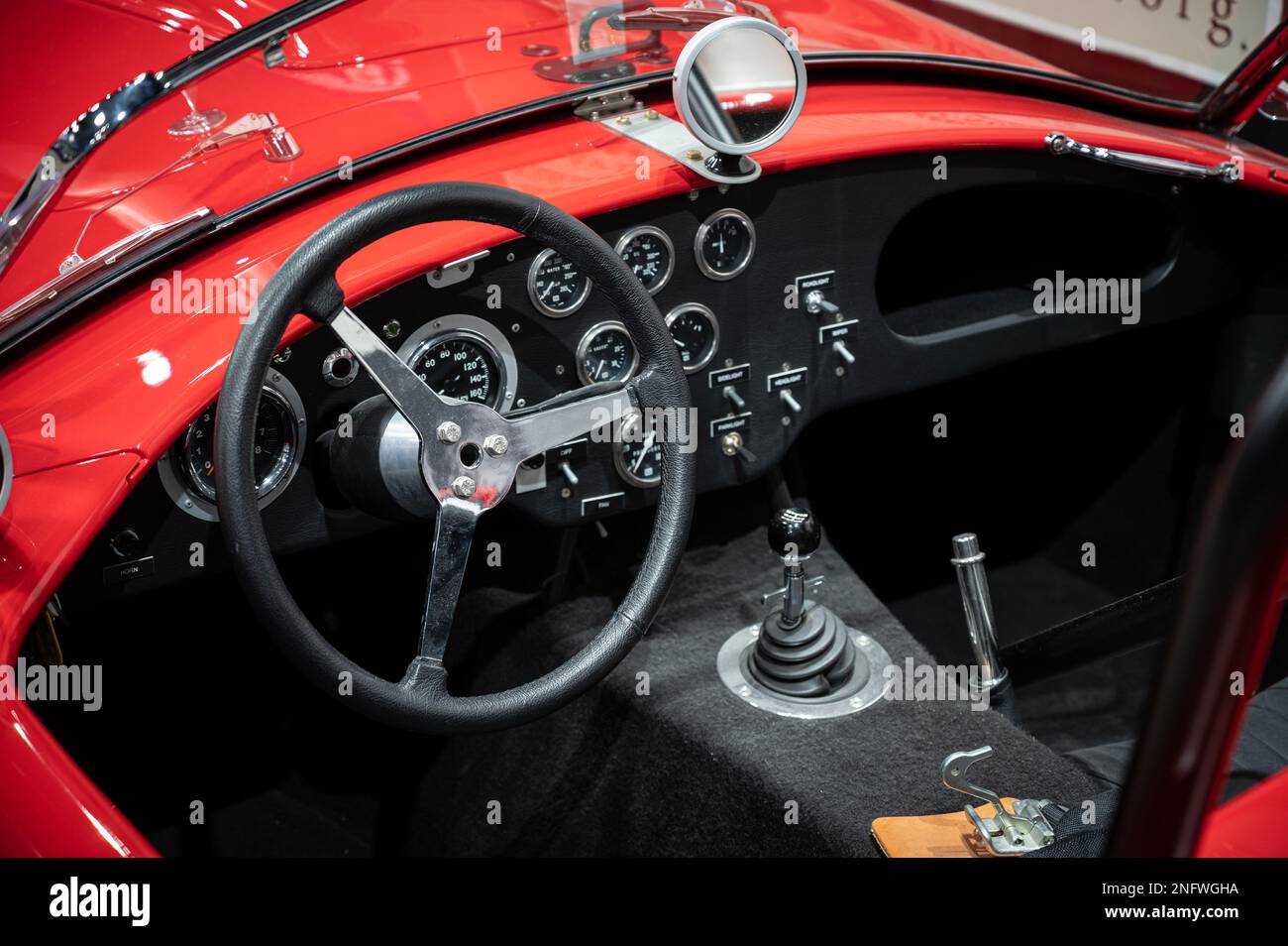 The interior detail of an exclusive AC Shelby Cobra, classic racing car ...