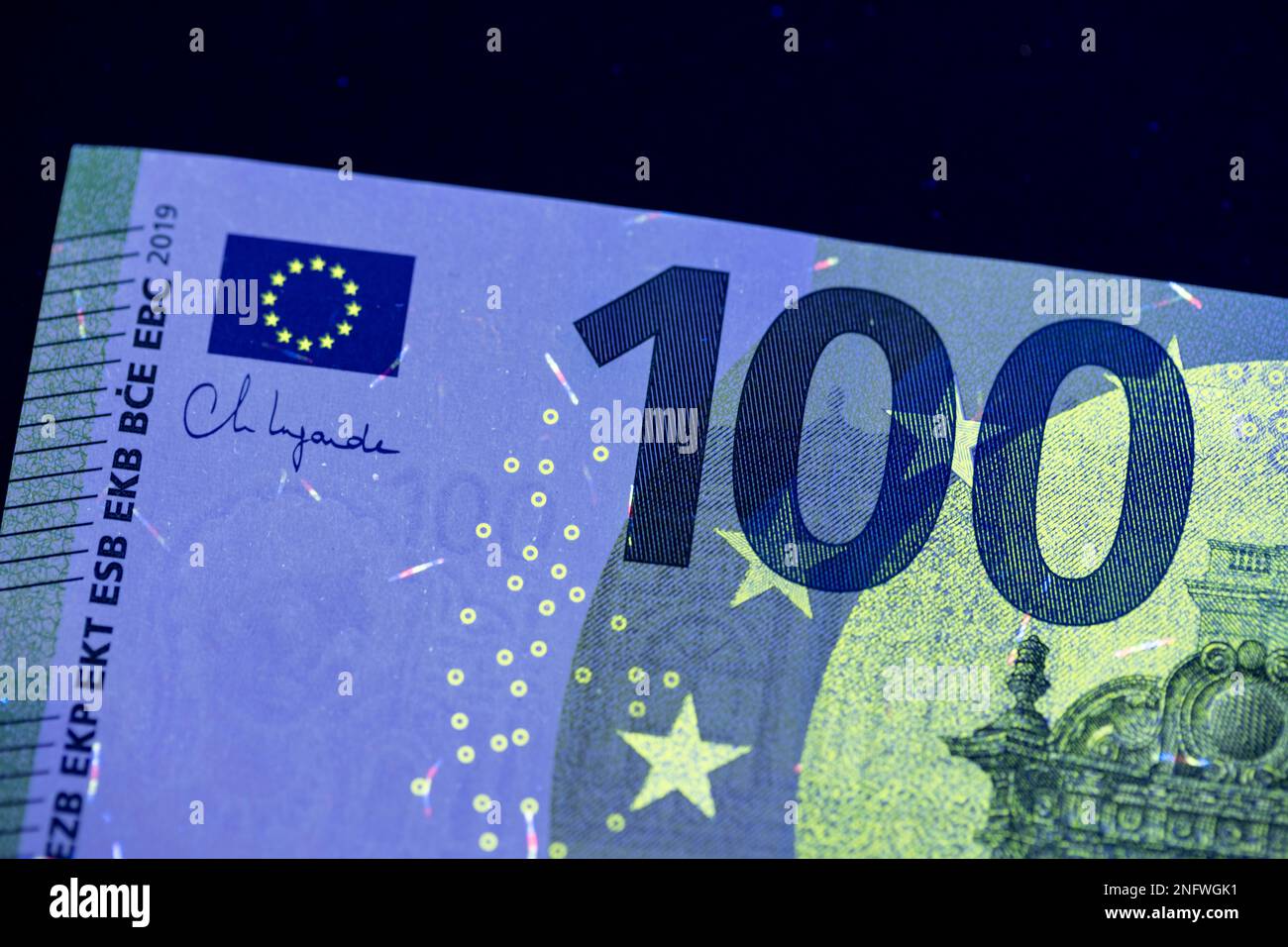 Euro currency in UV light protection. Euro in UV light to check the ...