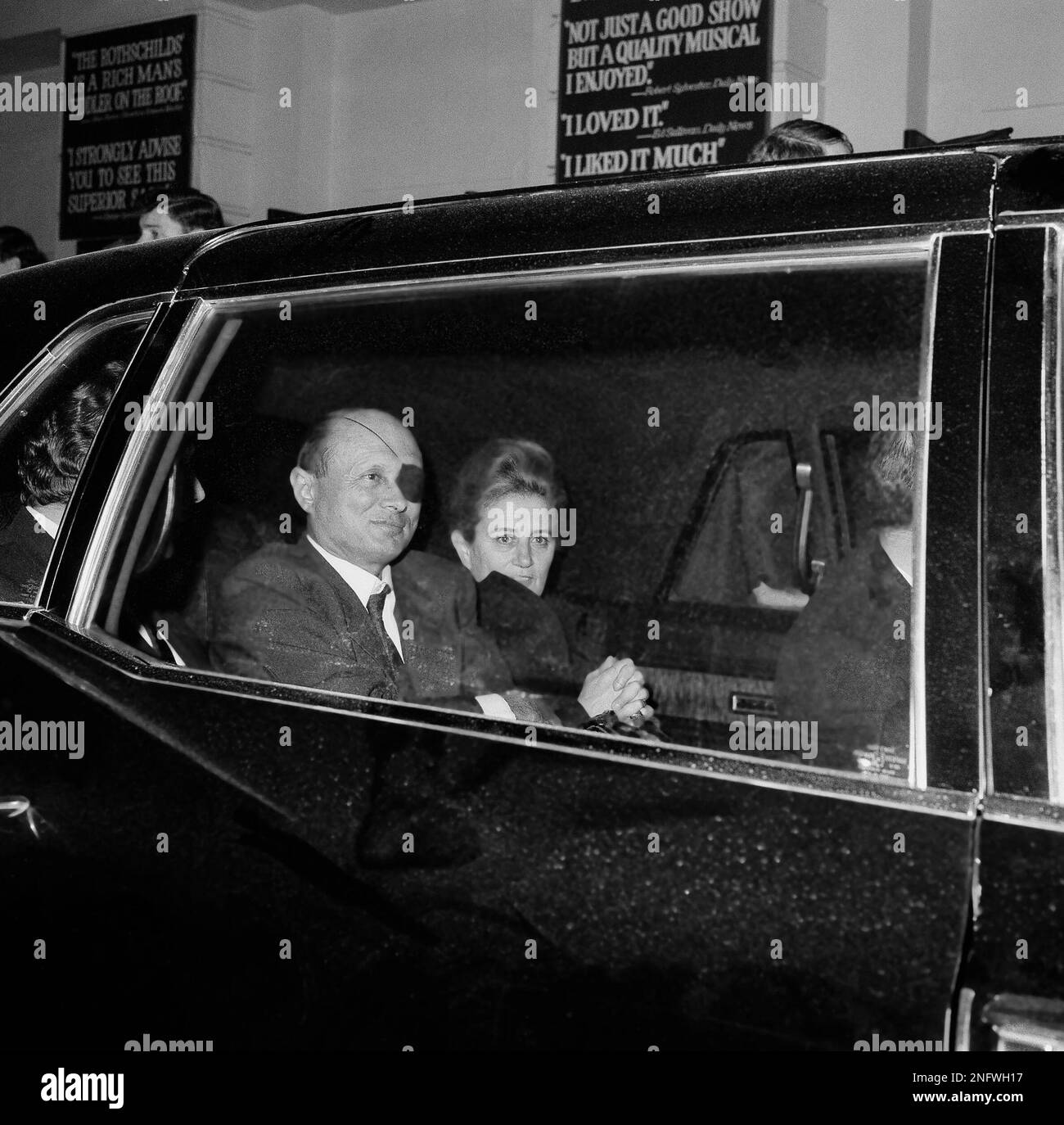 Moshe Dayan and wife, Ruth, in car outside theater at intermission on ...