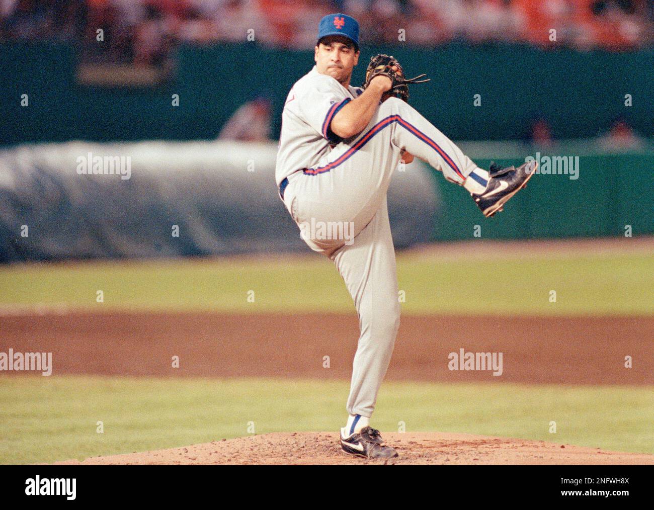 New York Mets' pitcher Sid Fernandez winds up on the mound during their ...