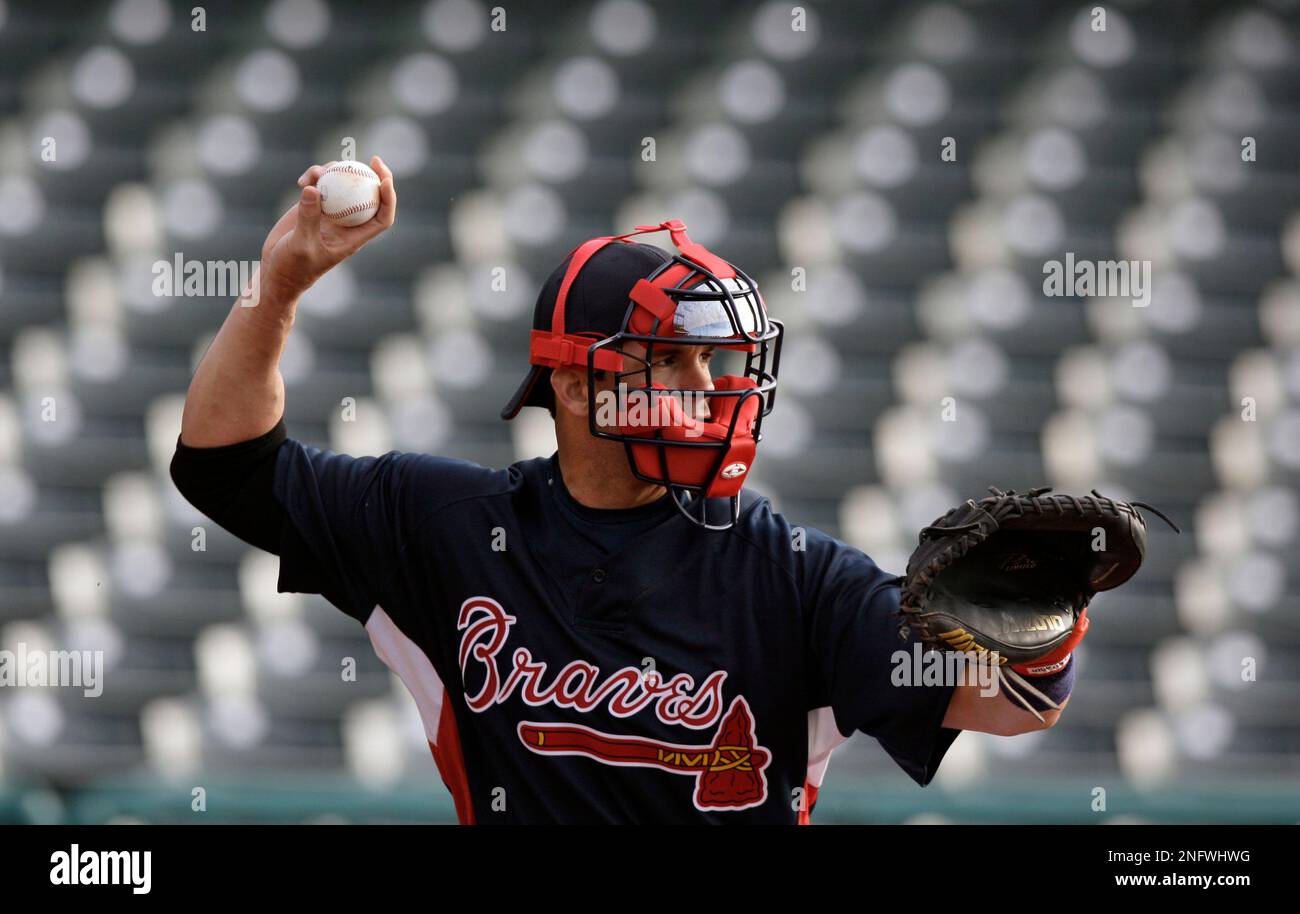 Atlanta Braves catcher Javy Lopez goes through a drill during a Major ...