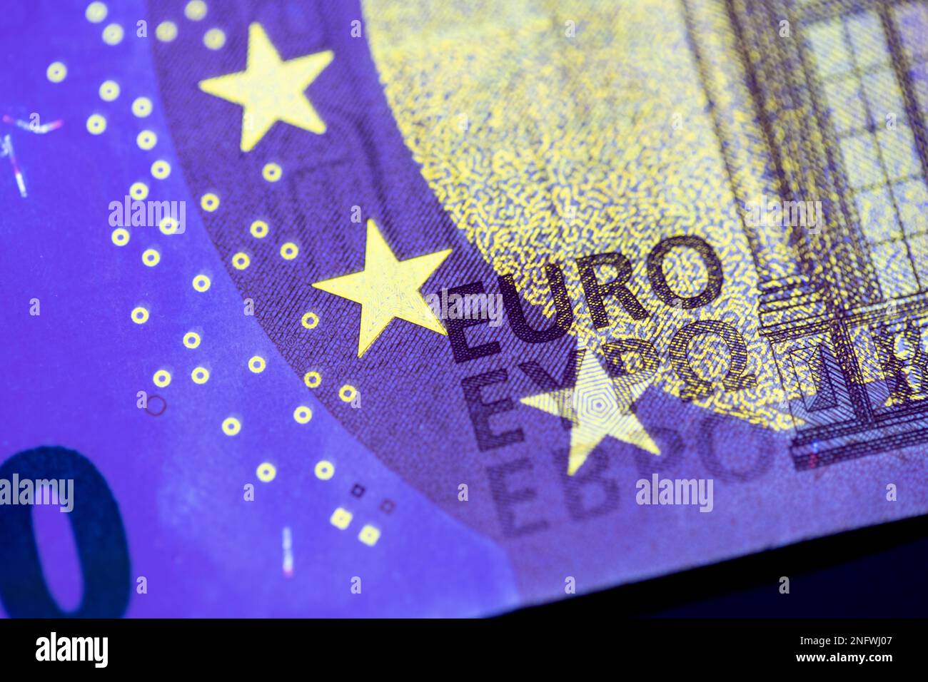 Euro currency in UV light protection. Euro in UV light to check the ...