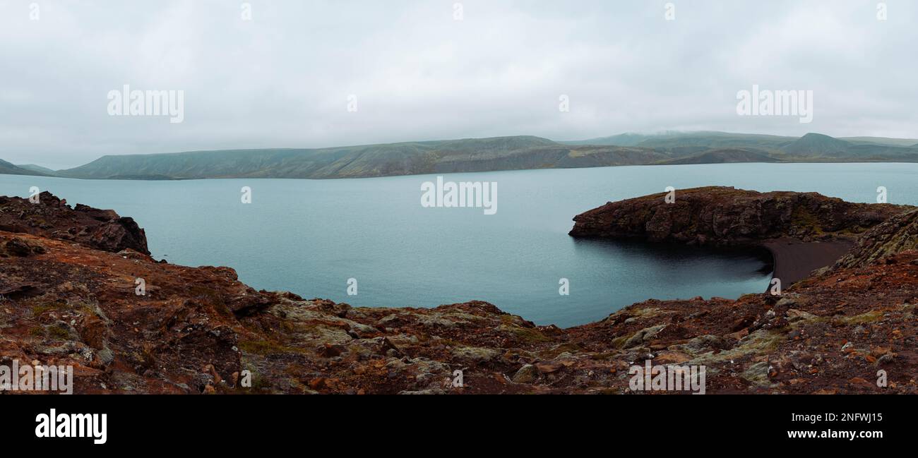 An aerial view of lake surrounded by cliffs Stock Photo - Alamy