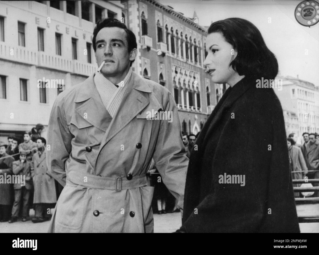 Italian film stars Vittorio Gassman and Silvana Mangano, right, wait ...