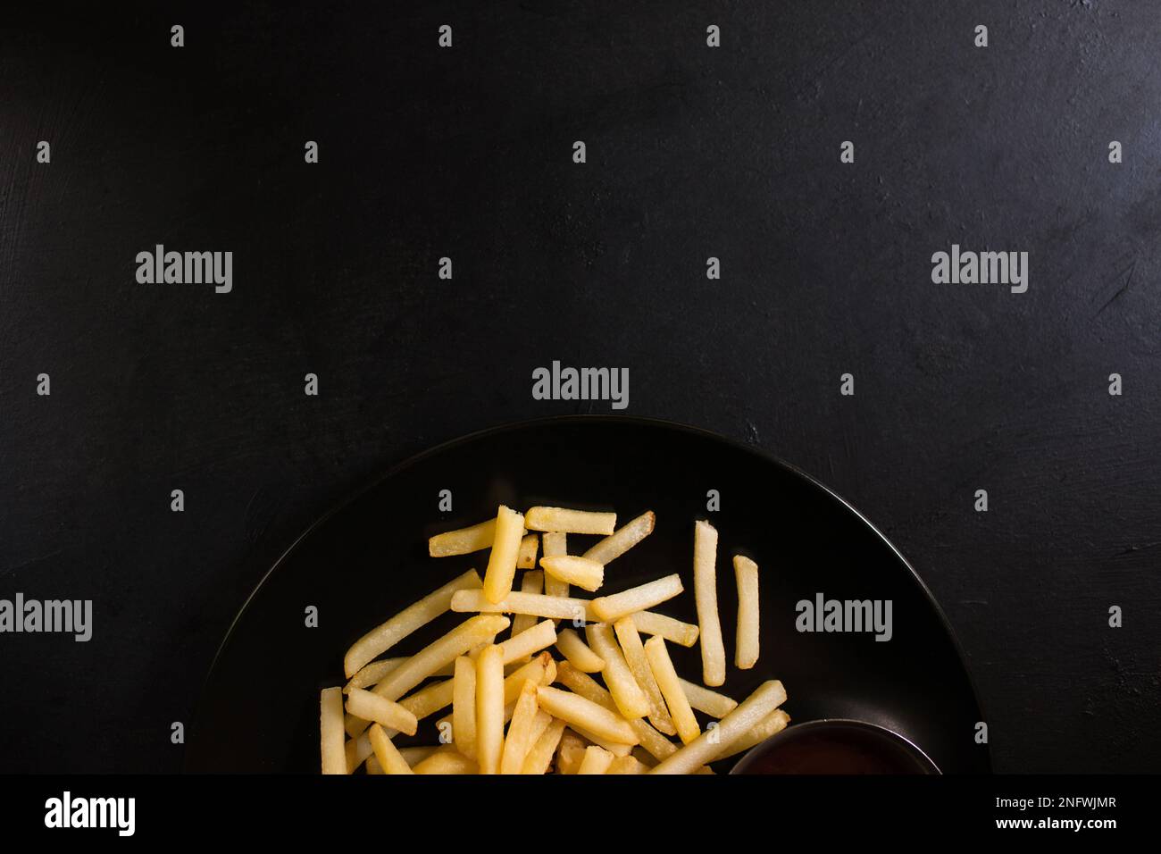 food photography art french fries junk concept Stock Photo - Alamy