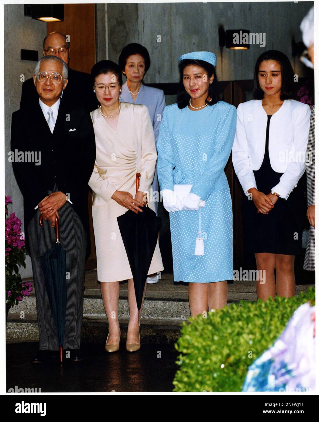 Masako Owada is sent off by her family Wednesday morning, June 9, 1993 ...