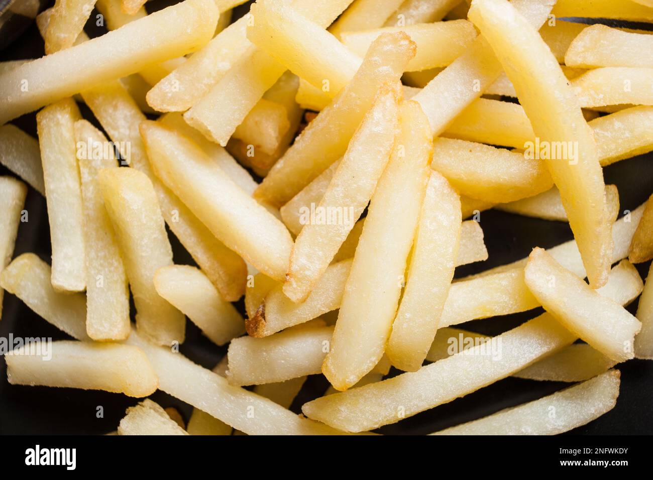 french fries background unhealth junk food concept Stock Photo - Alamy