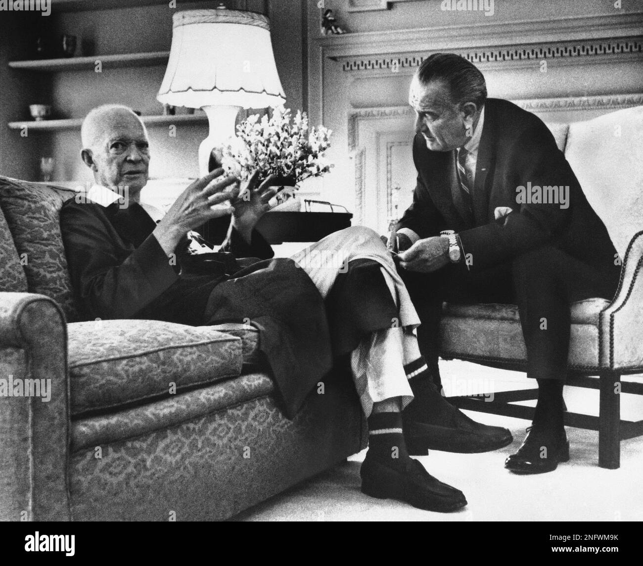 President Lyndon Johnson, at right, chats with former President Dwight ...