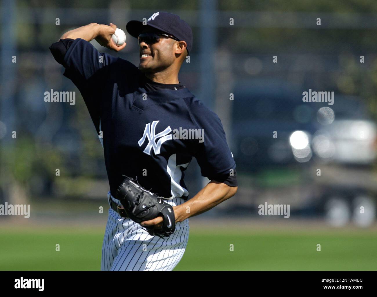 New York Yankees pitcher Mariano Rivera throws in the outfield during a ...