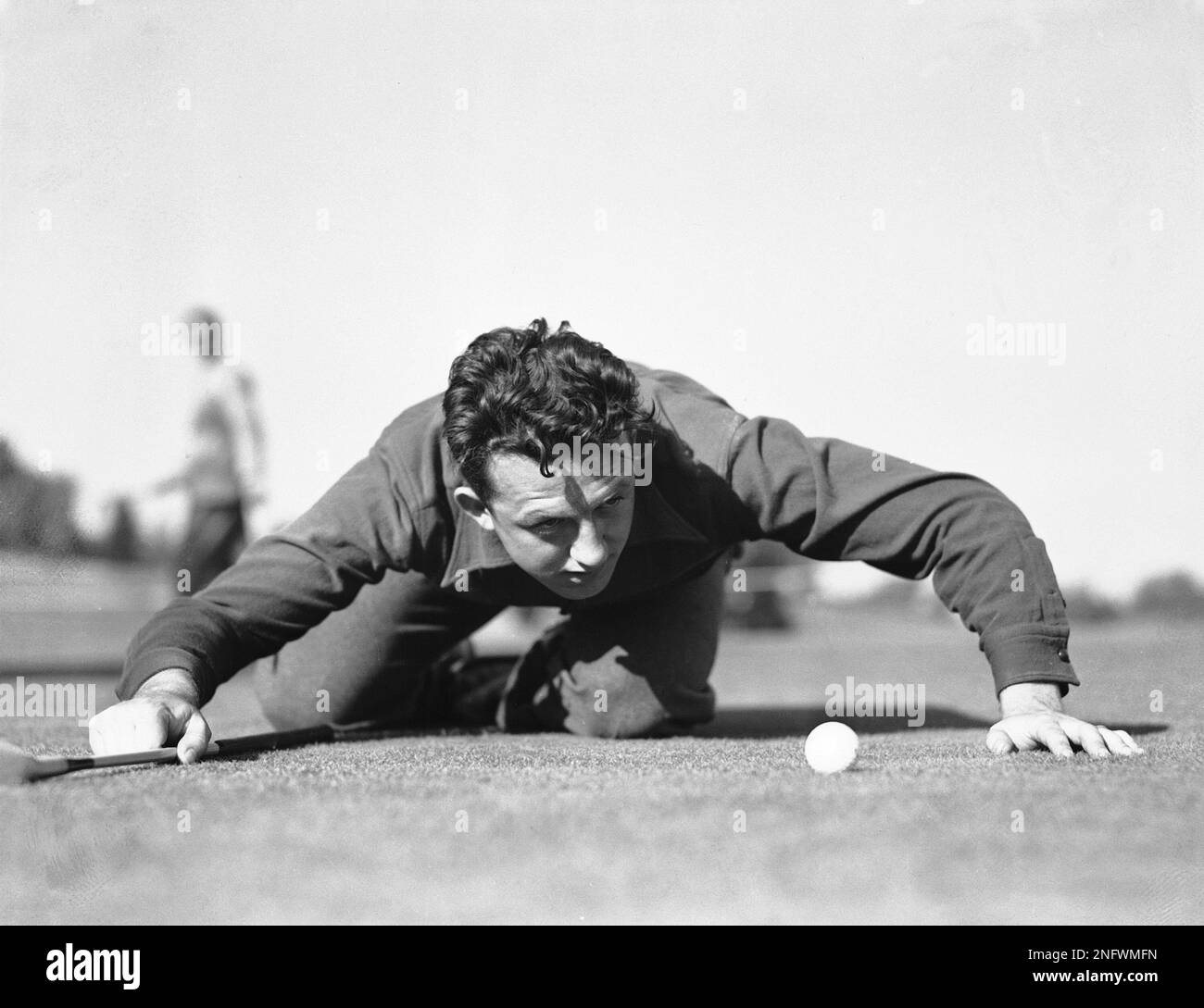 Golfer Ray Billows lines up a putt in the $12,000 Belmont Open in ...