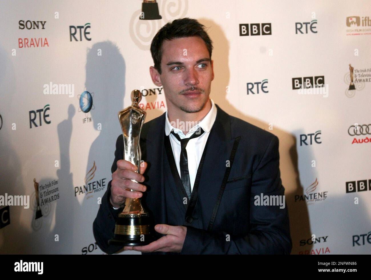 Actor Jonathan Rhys Meyers collects his award for Best Leading Actor at ...