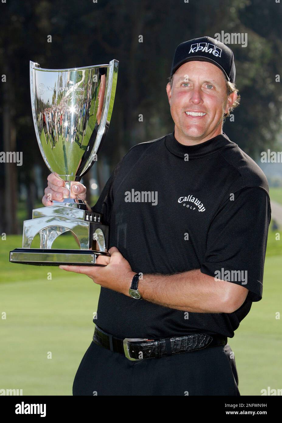 Phil Mickelson poses with his trophy after winning the Northern Trust ...