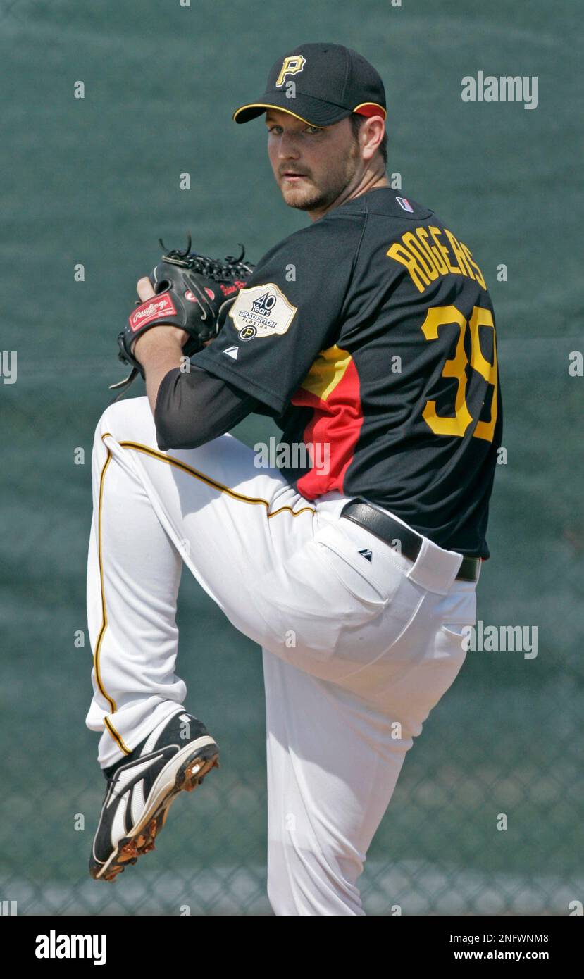 Pittsburgh Pirates pitcher Brian Rogers pitches at baseball spring ...
