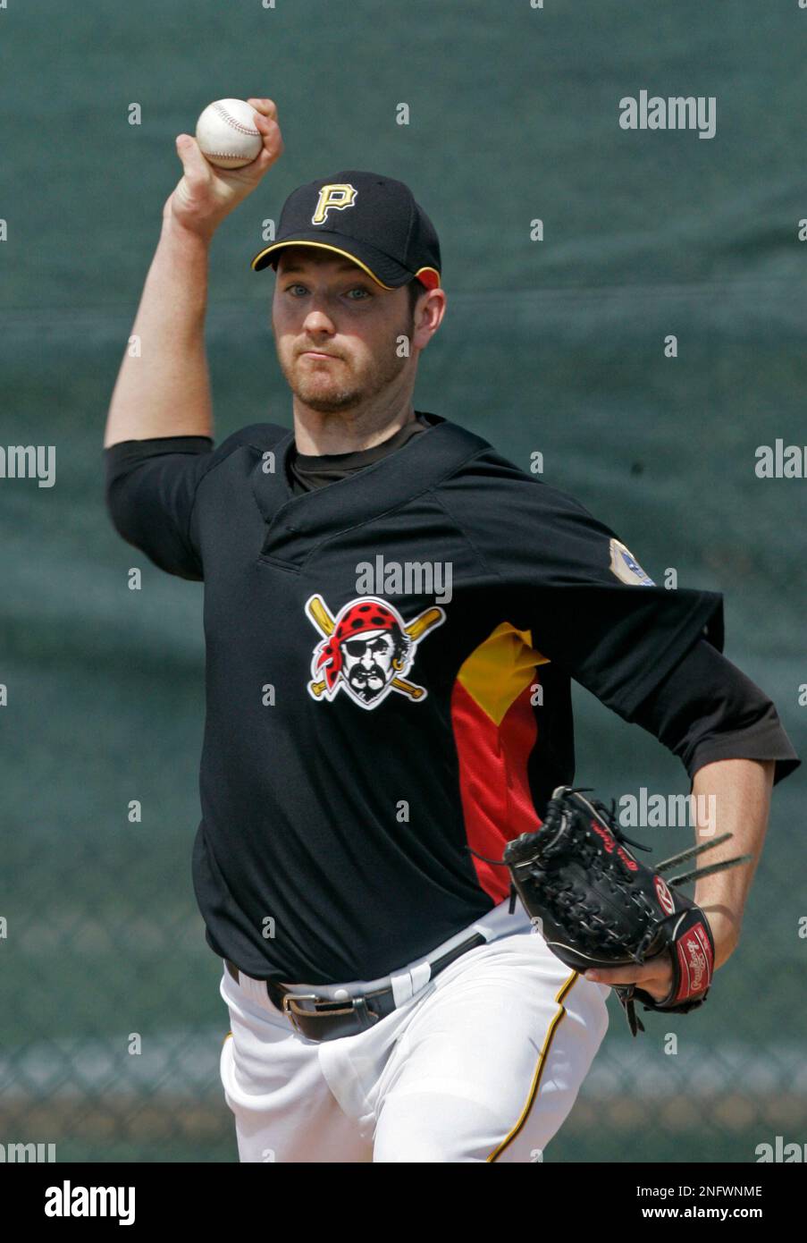Pittsburgh Pirates pitcher Brian Rogers pitches at baseball spring ...