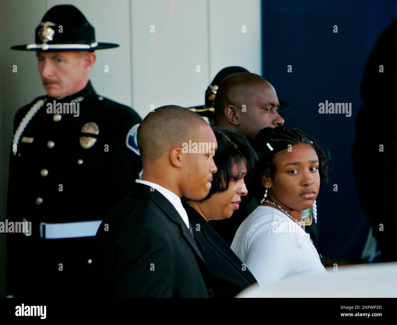 Slain SWAT team member Randal Simmons' family members: son Matthew ...