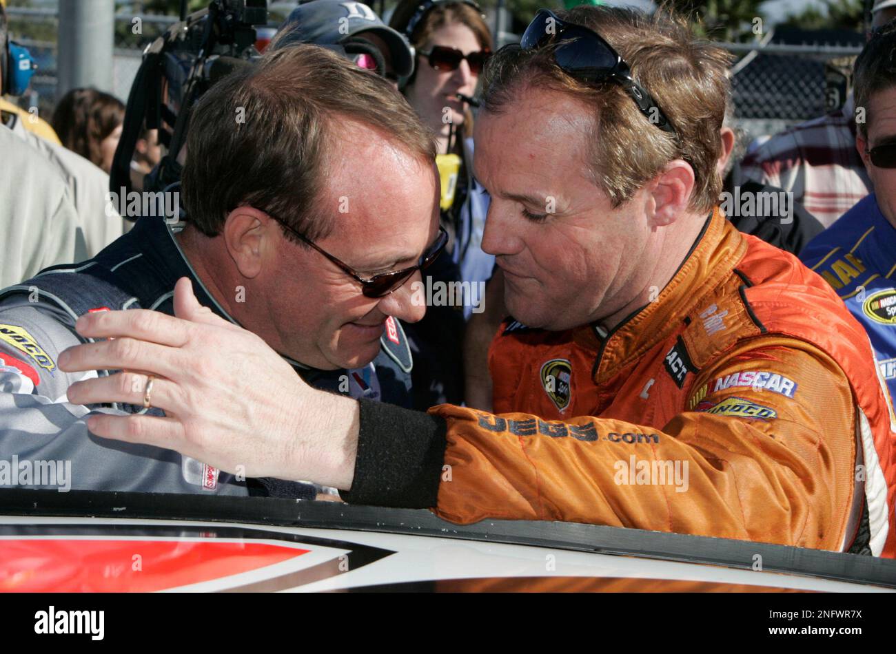 NASCAR drivers Ken Schrader, left, and Joe Nemechek confer following ...