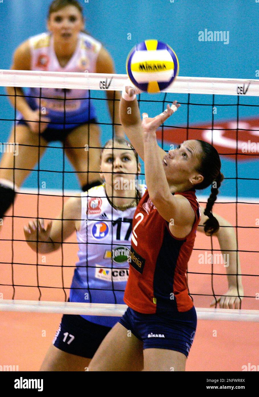 Swiss Volleyball players Robyn Ah Mow Santo, foreground, returns the ...