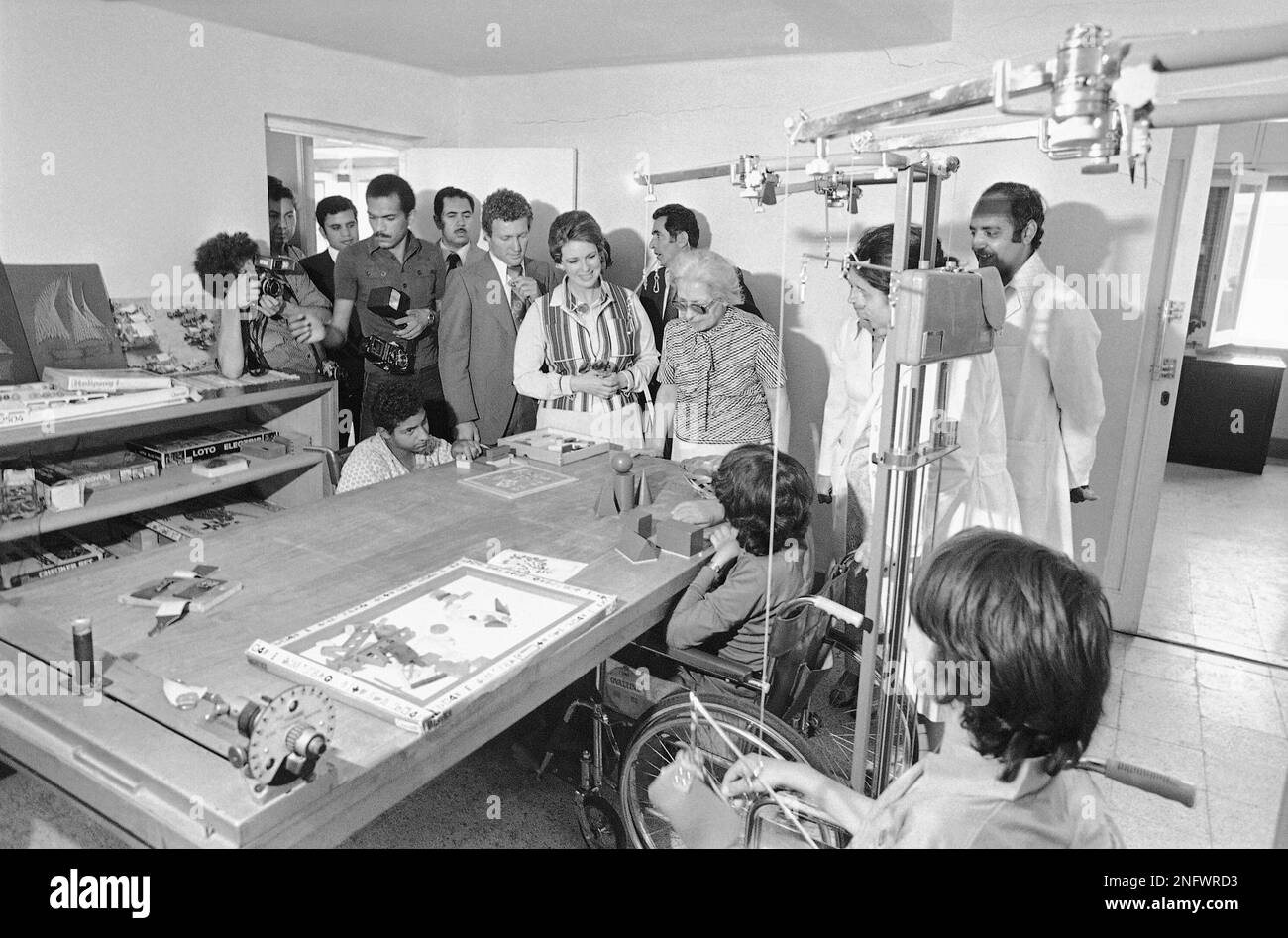 Mrs. Aliza Begin and Mrs. Jian Sadat and children visit a ...