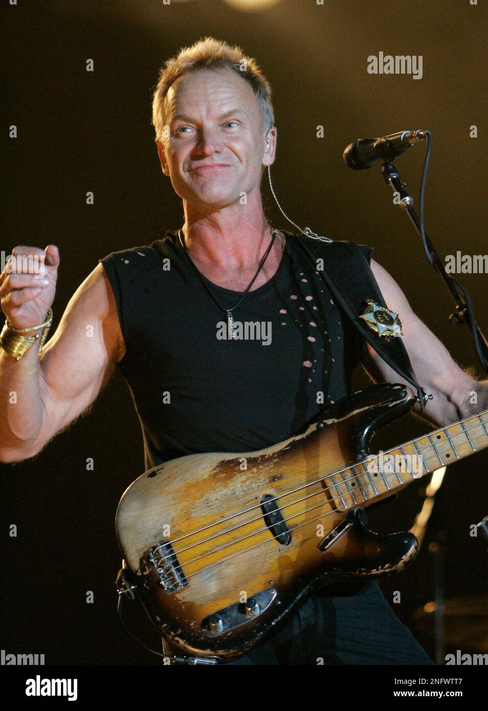 Lead vocalist and bassist Sting of The Police performs during a concert ...