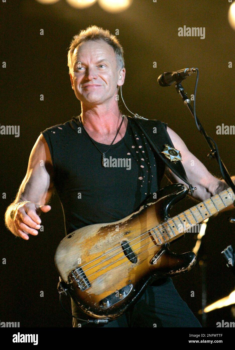 Lead vocalist and bassist Sting of The Police performs during a concert ...
