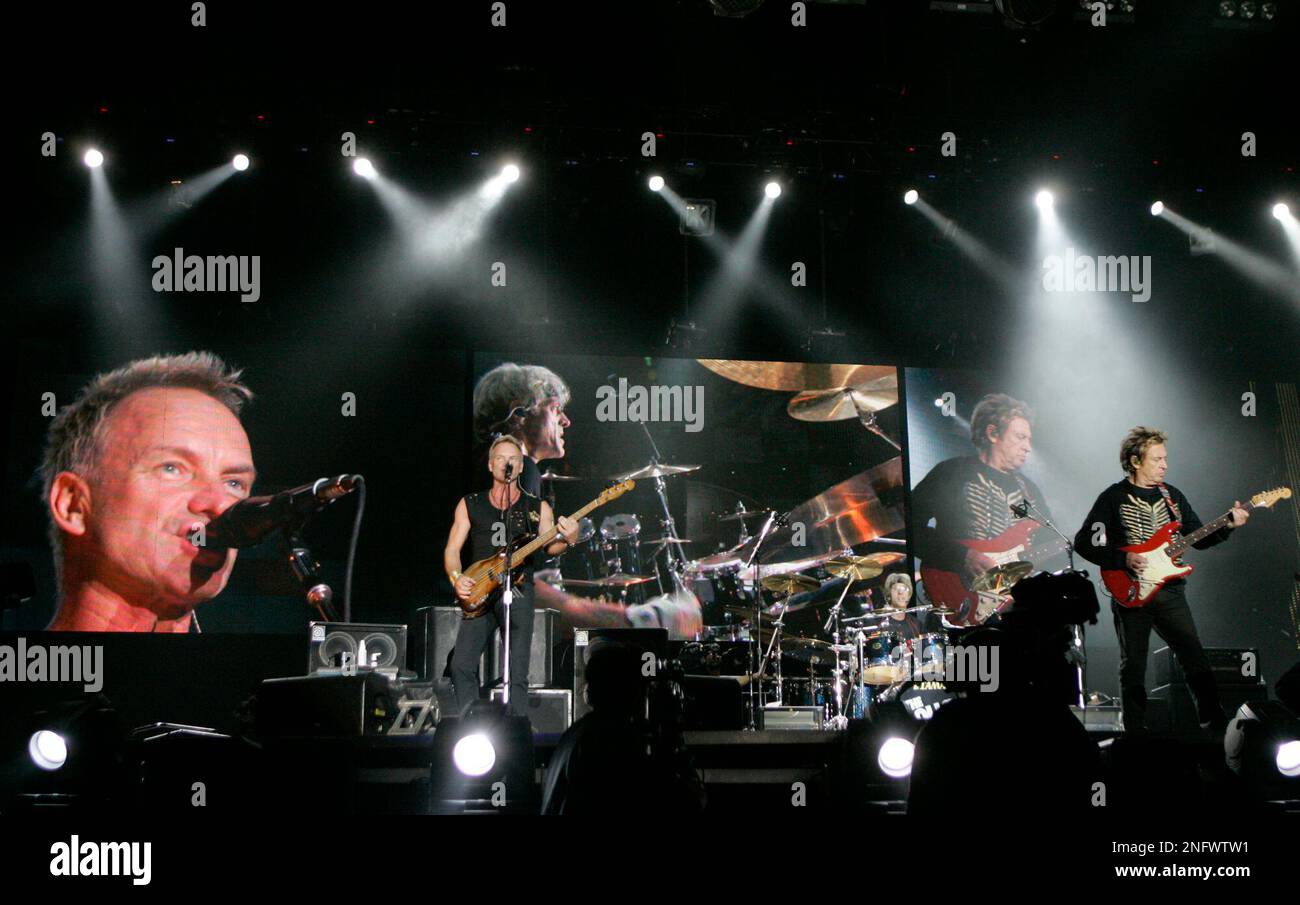 Lead vocalist and bassist Sting, left, guitarist Andy Summers, right ...