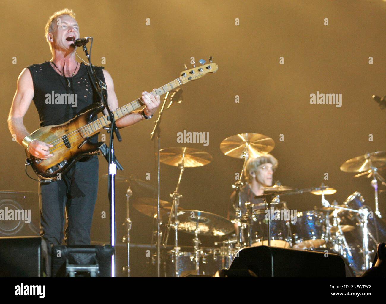 Lead vocalist and bassist Sting, left, and drummer Stewart Copeland of ...
