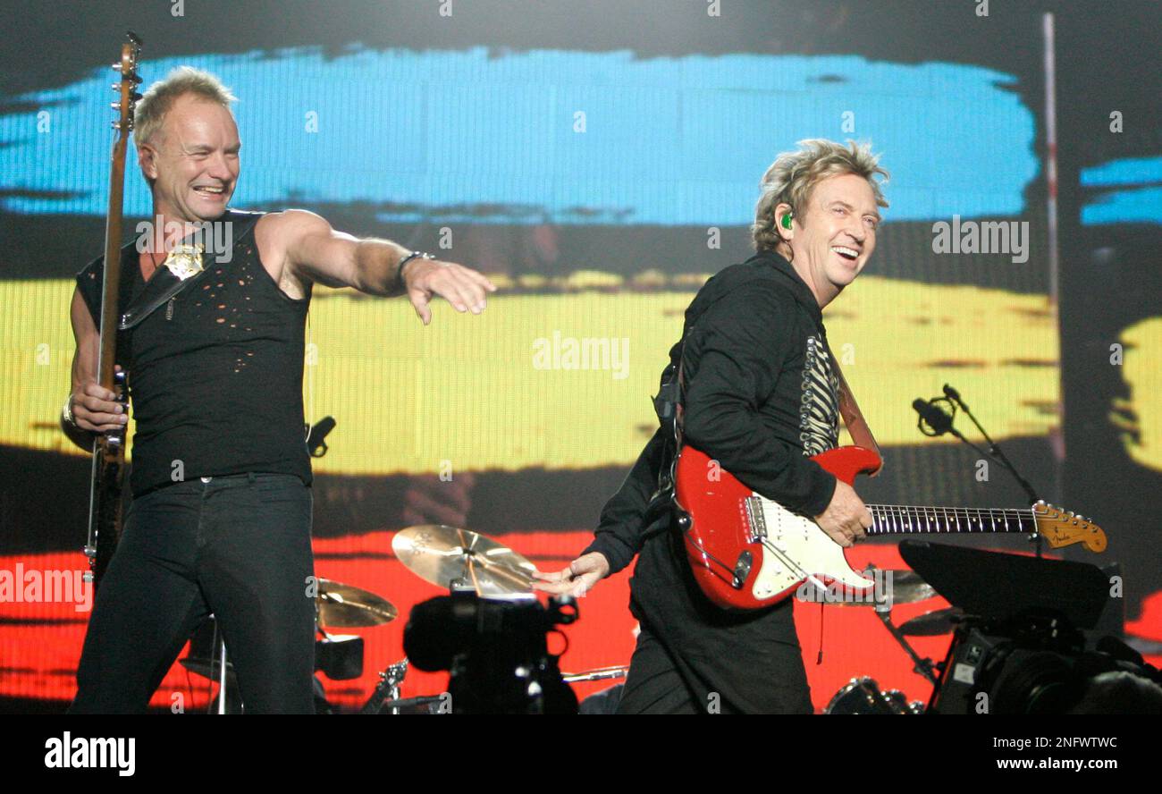 Lead vocalist and bassist Sting, left, guitarist Andy Summers of The Police perform during a ...