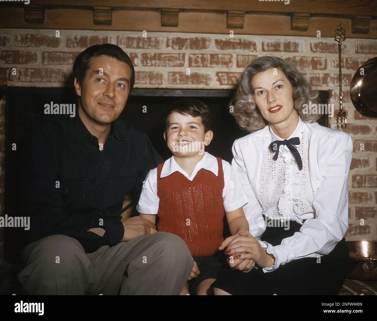 Actor Ray Milland, left, with his wife Muriel and their son Danny pose ...