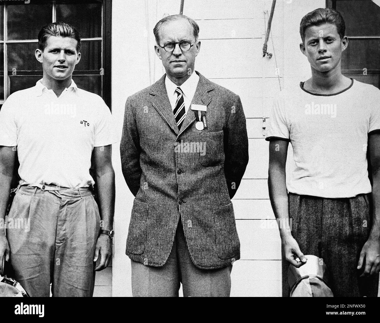 Joseph P. Kennedy, center, member of the Harvard class of 1912, with ...